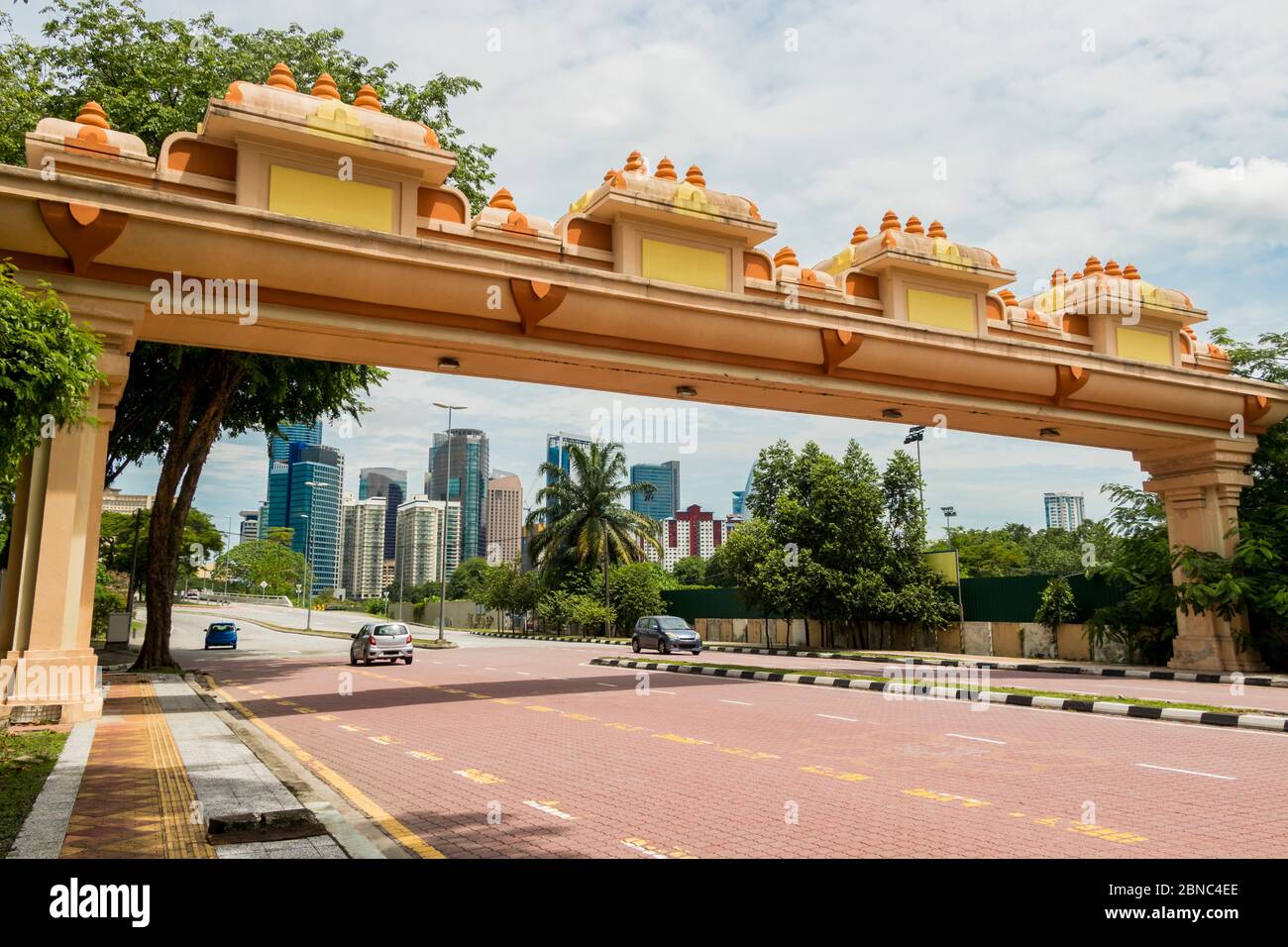 Orange yellow street road gate Kuala Lumpur Stock Photo - Alamy