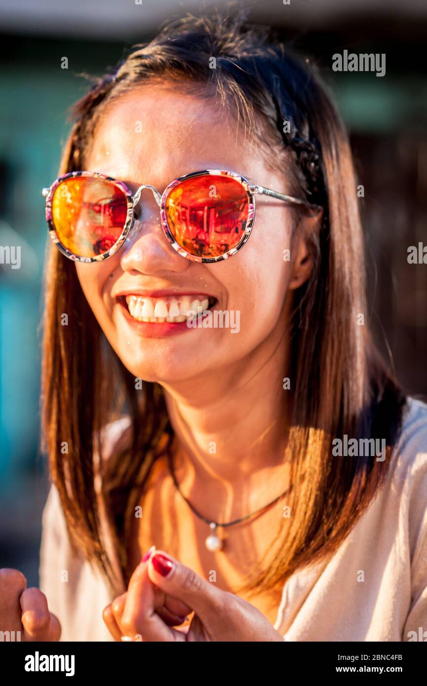 A pretty Filipino girl with a stunning smile poses Stock Photo - Alamy