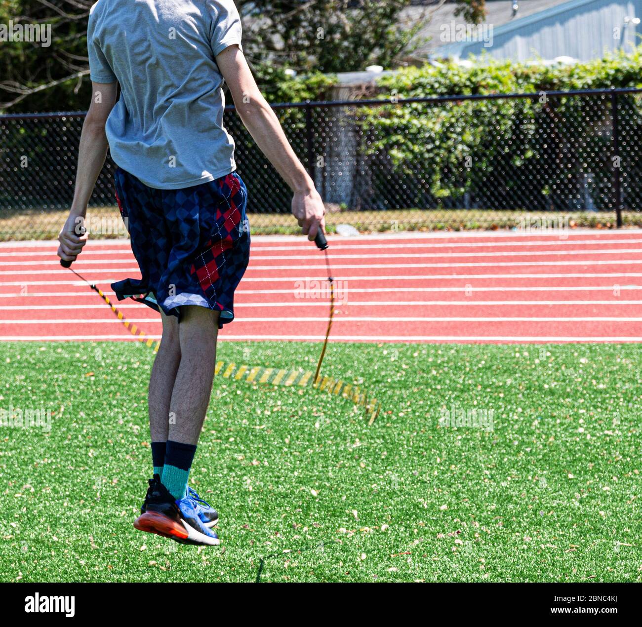 Boy skipping rope hi-res stock photography and images - Alamy