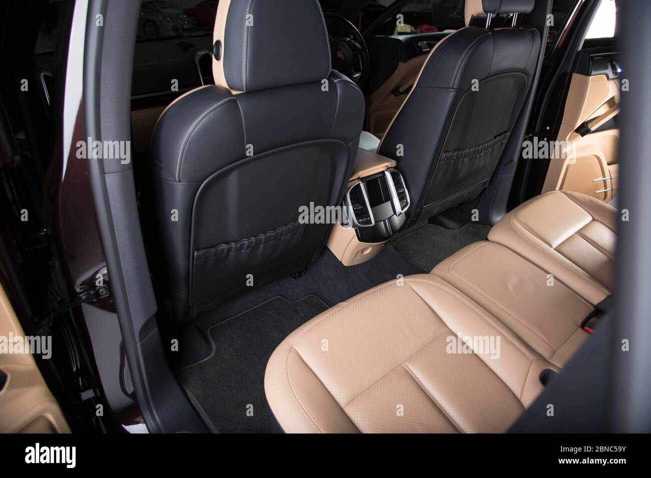 Beige interior of a luxury car under the lights - transportation ...
