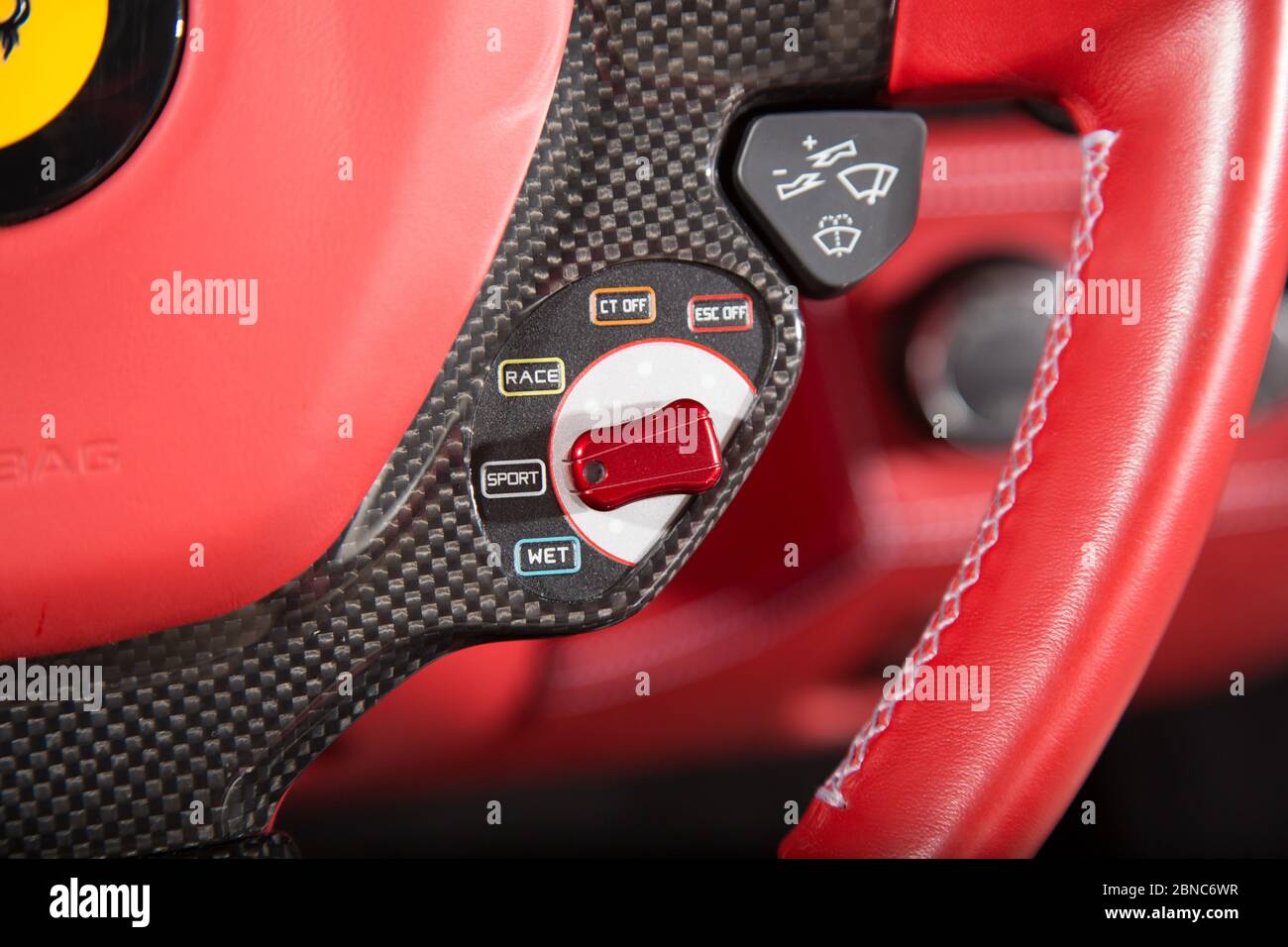 Closeup of the control buttons on a steering wheel of a modern car ...