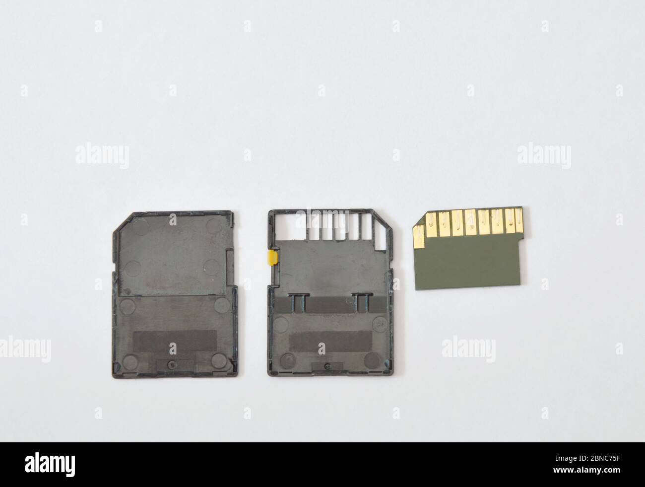 secure digital card separate part on white background Stock Photo - Alamy