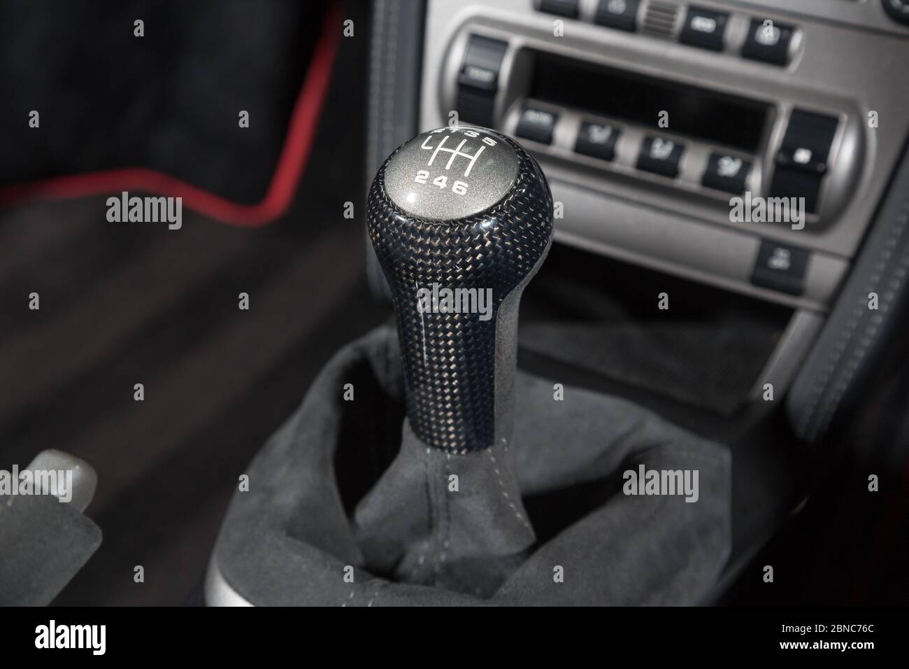Gear shift and control buttons of a black car Stock Photo - Alamy