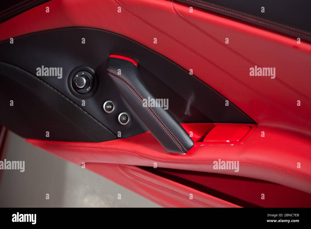 Beautiful red interior of a luxurious car with red and black details ...