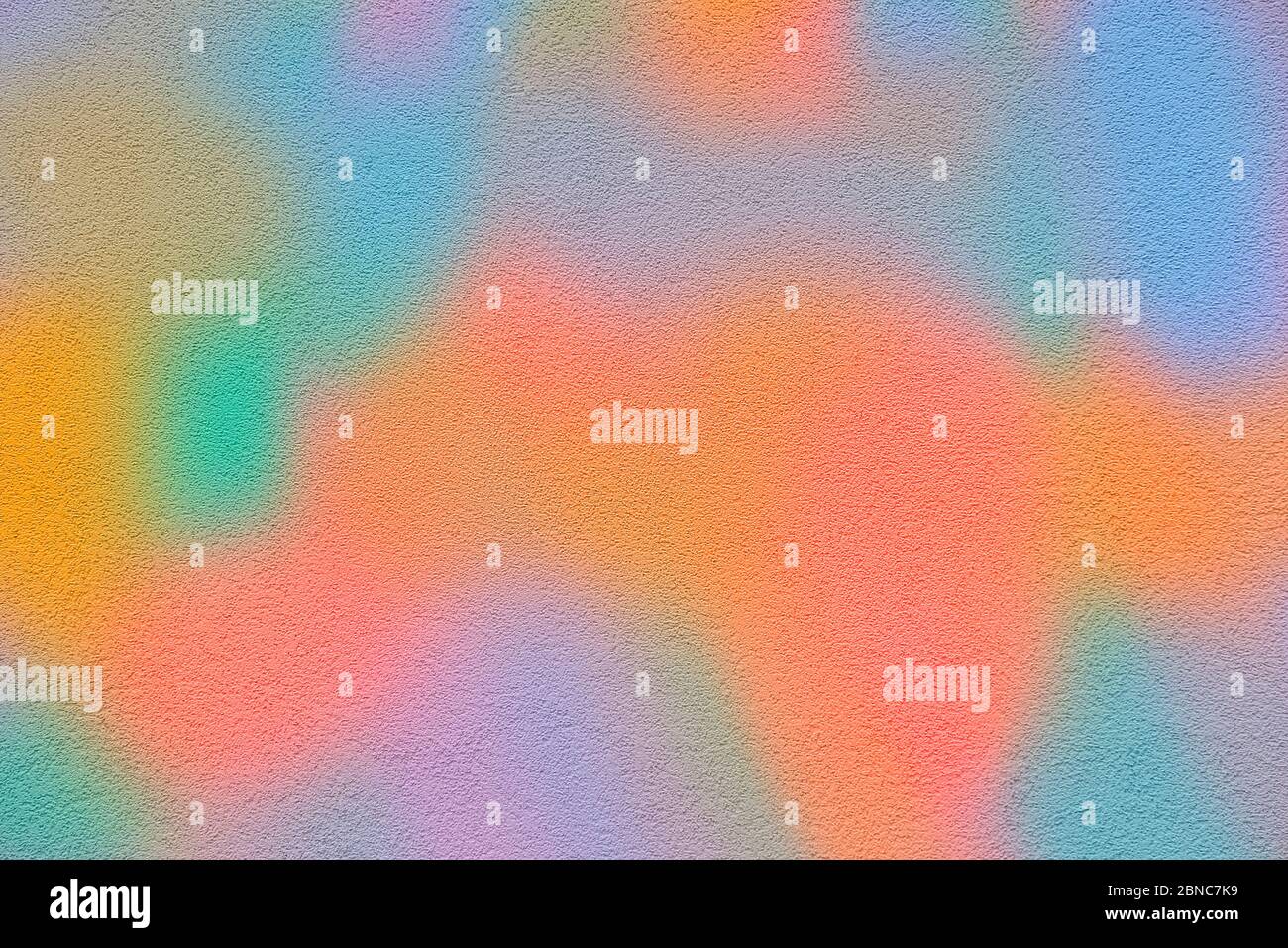 Multicolor painted background from building wall. Different colors ...