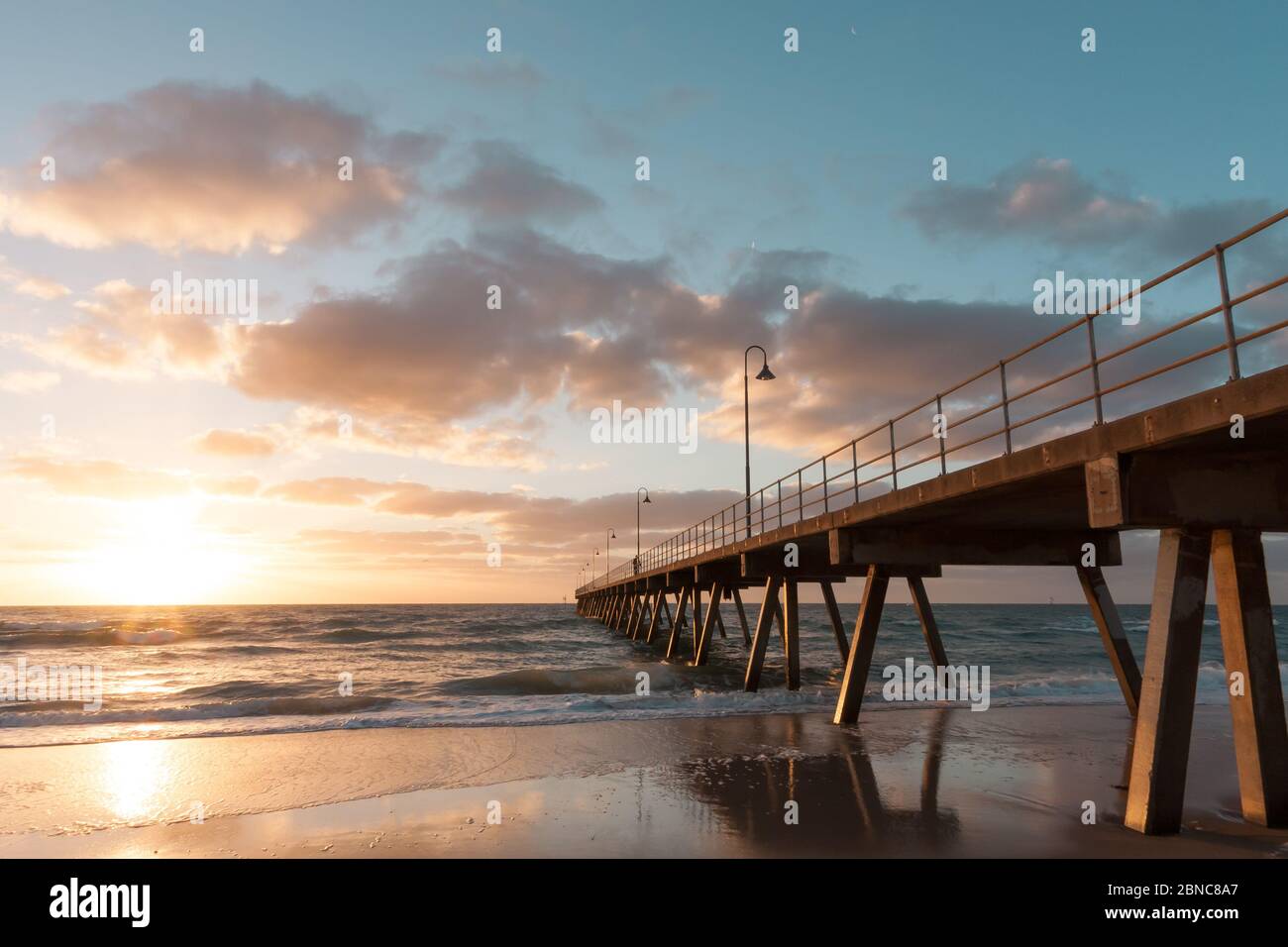 Silhouette of Glenelg Jetty at sunset. South Australia, Adelaide ...