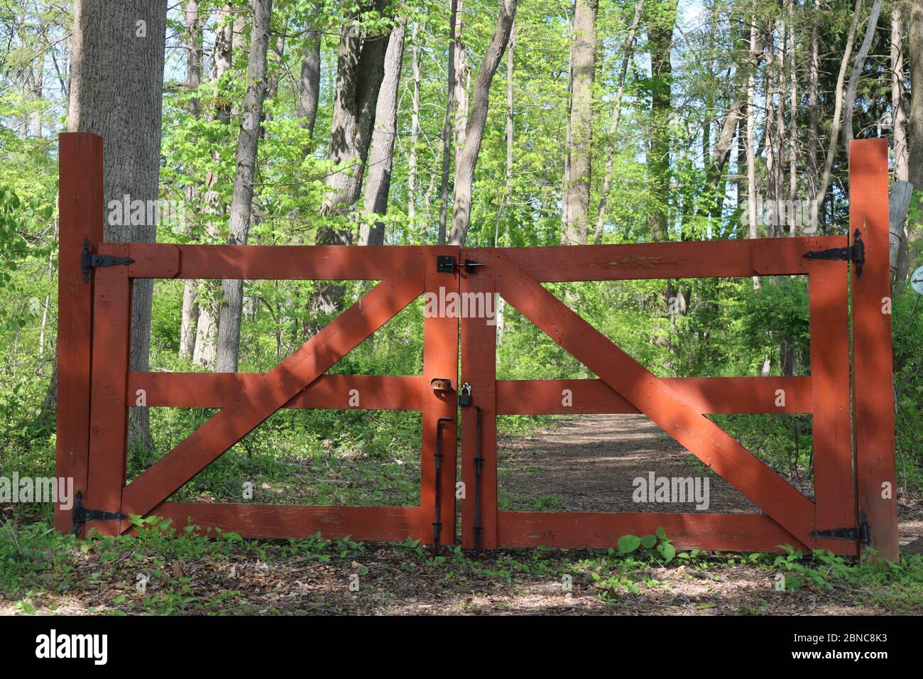 Red gate to the par Stock Photo - Alamy