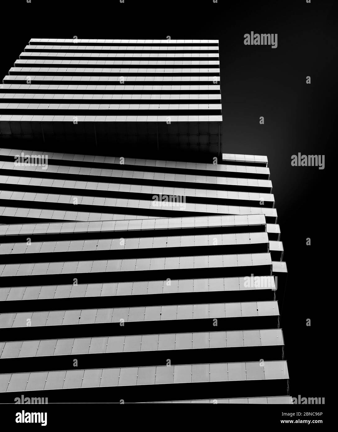 Vertical greyscale shot of big square blocks n a black background Stock ...