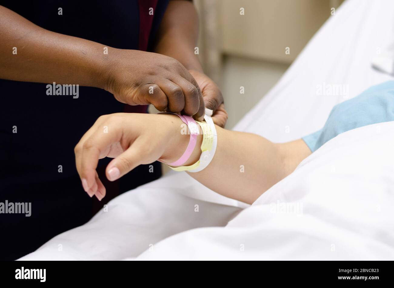 An image of a woman being admitted into hospital Stock Photo - Alamy