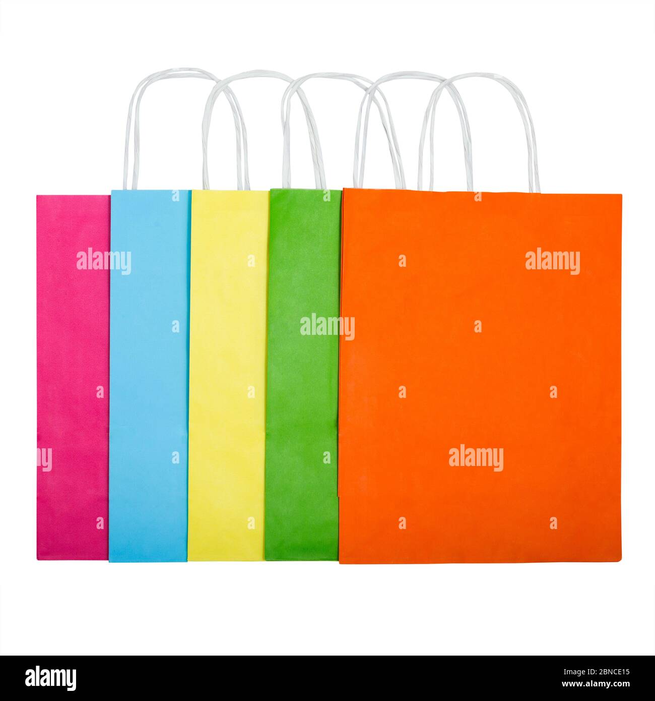 Colorful paper bags isolated on white Stock Photo - Alamy