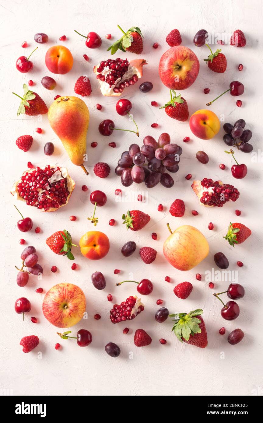 Wallpaper abstract composition of fruits. Red food pattern. Healthy ...