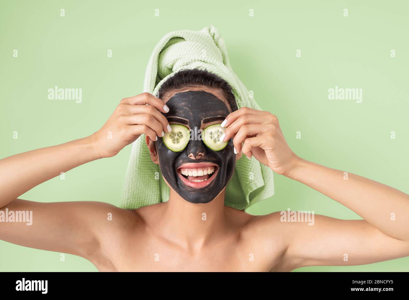 Happy Smiling Girl Applying Facial Carbon Mask Portrait Young Woman