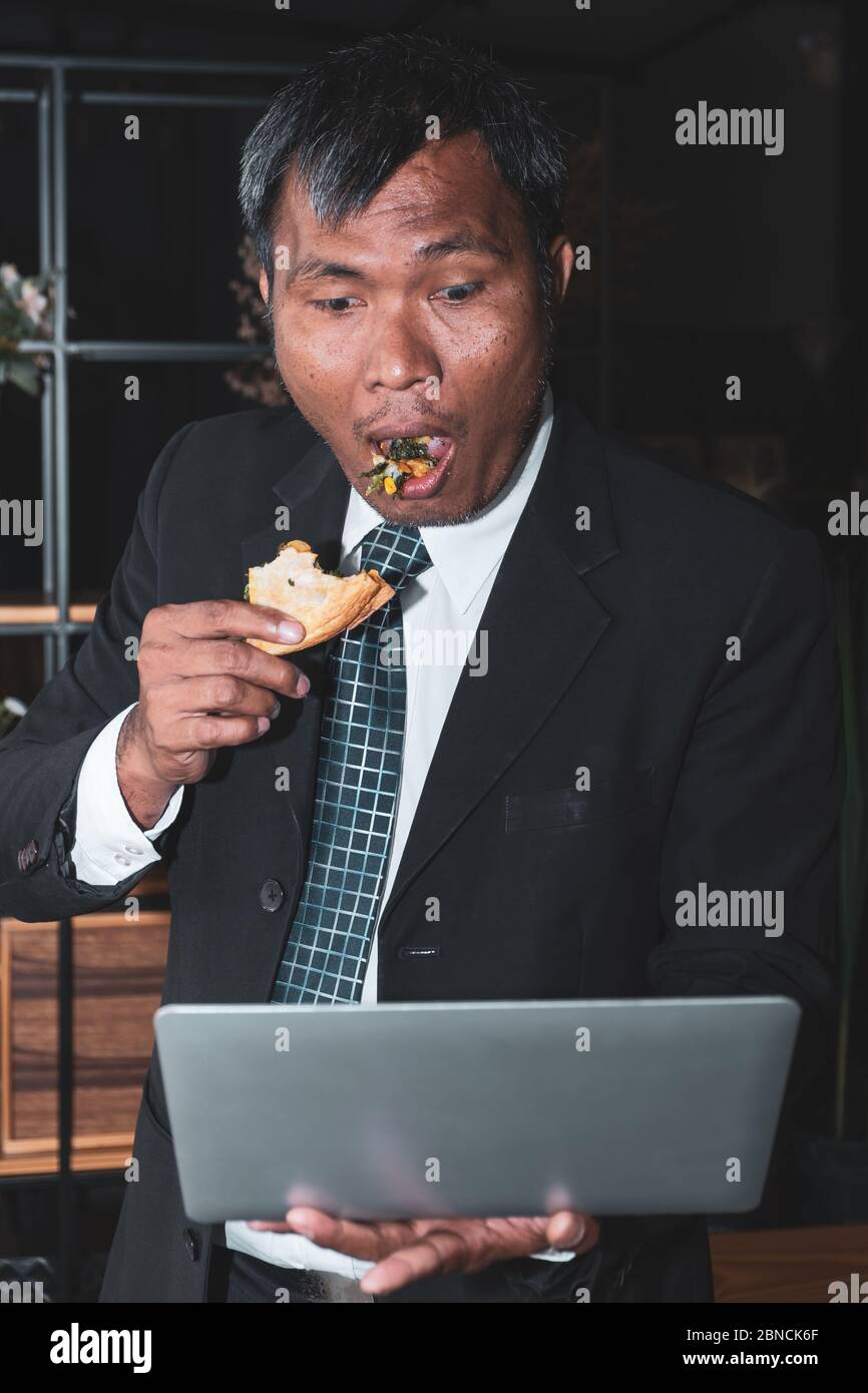 Asian man black hair tan skin tone wear former suite is shocked with ...