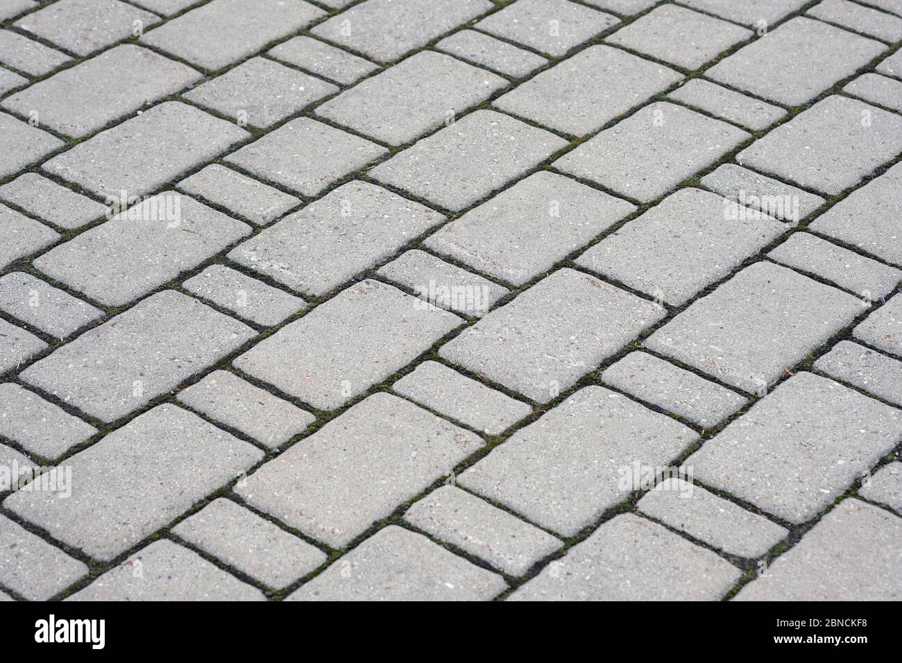 Texture of gray paving slabs. Diagonal line tiles for footpath ...
