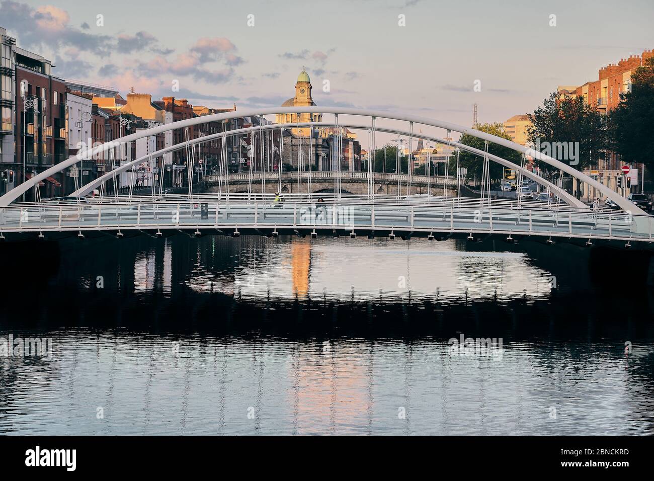 Serene view of the Liffey river's bridge Stock Photo - Alamy