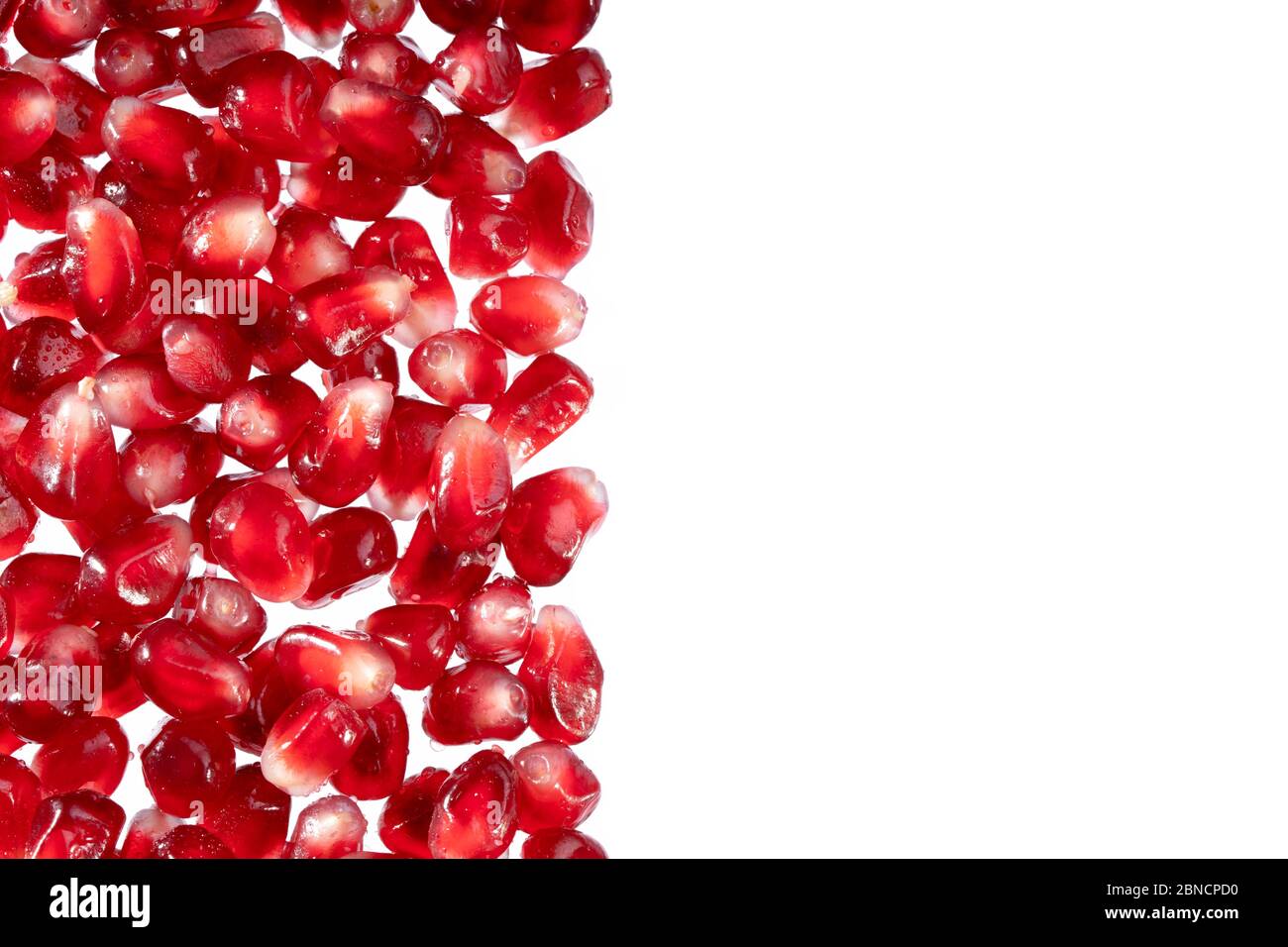 Pomegranate or garnet red seeds frame creative layout. Juice seeds ...