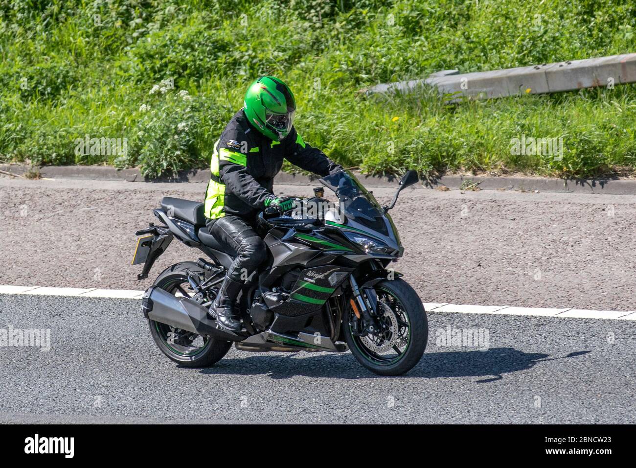 Kawasaki Ninja Motorbike rider; two wheeled transport, motorcycles ...