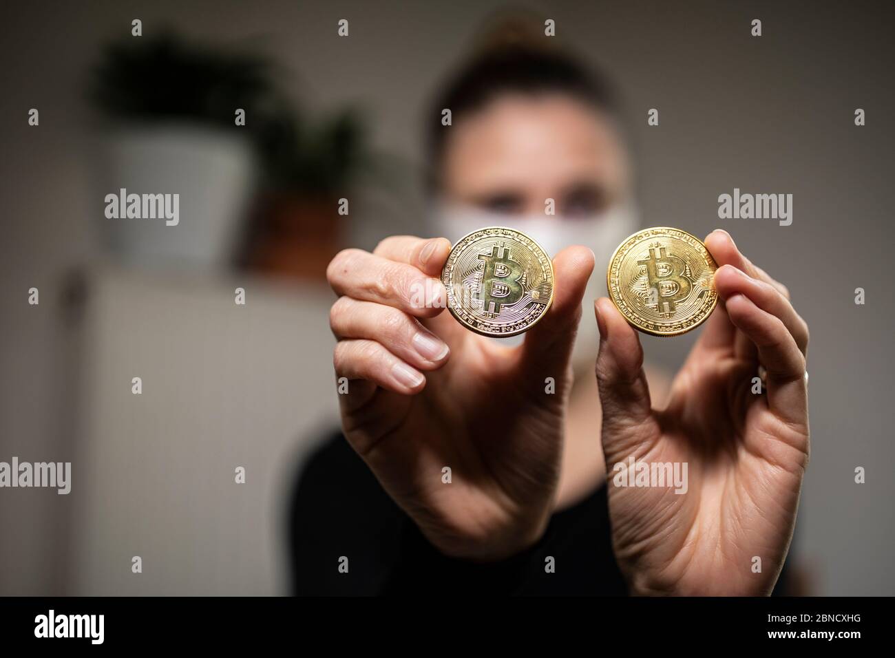 Person holding out face mask hi-res stock photography and images - Alamy