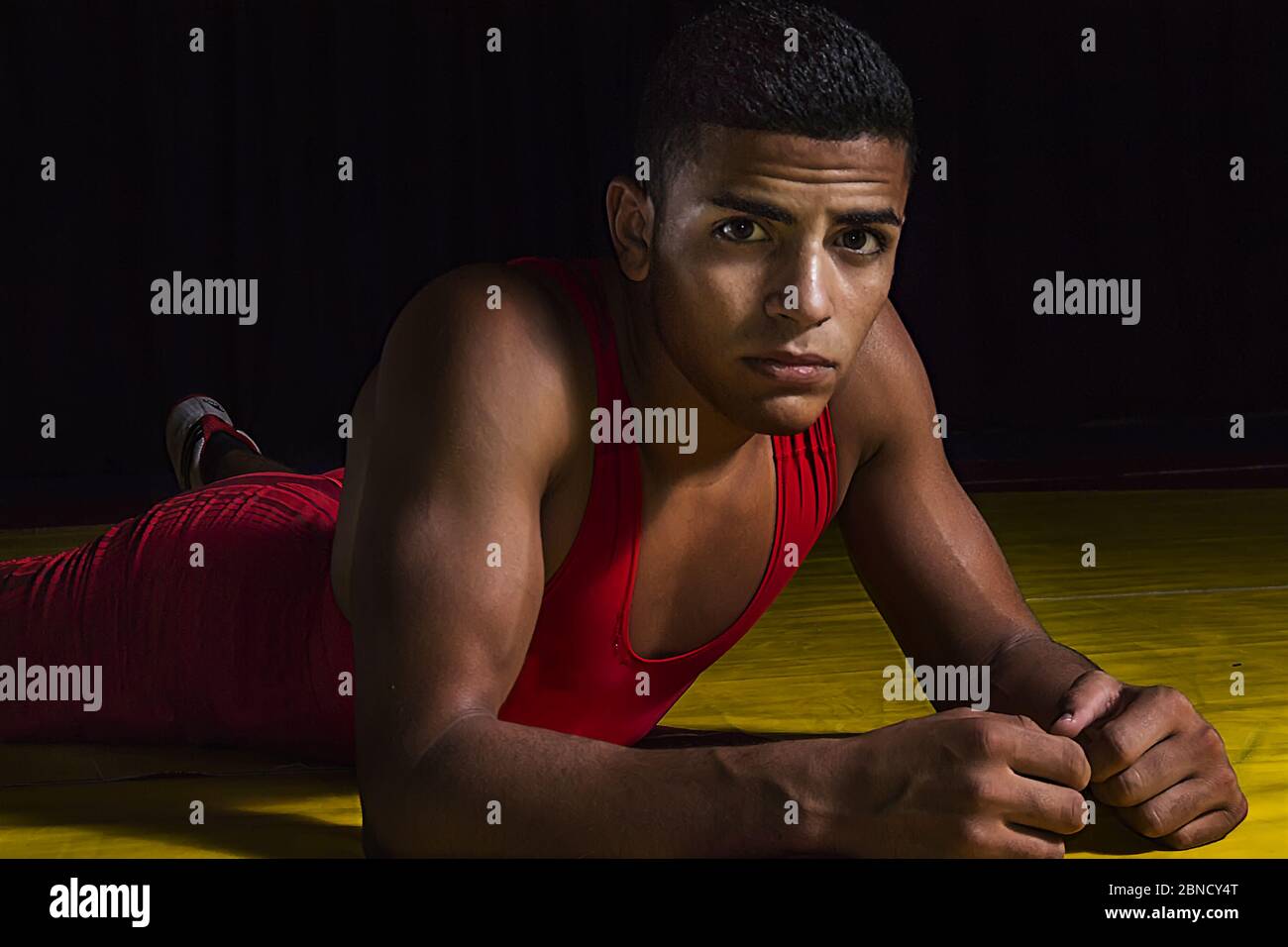 wrestler lying on the fighting mat Stock Photo - Alamy