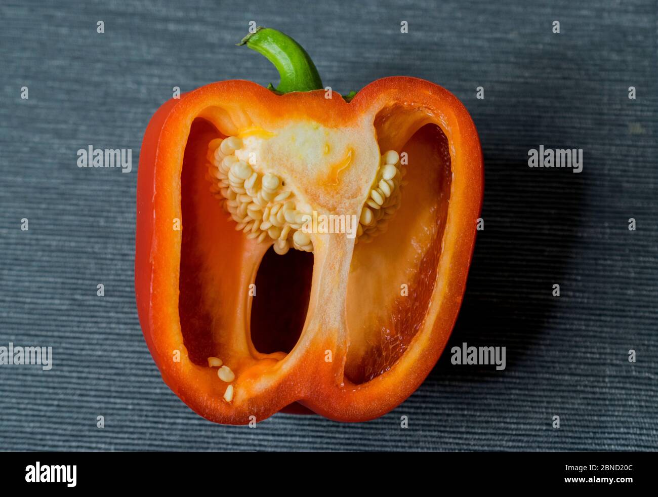 Red capsicum pepper cut in half hi-res stock photography and images - Alamy
