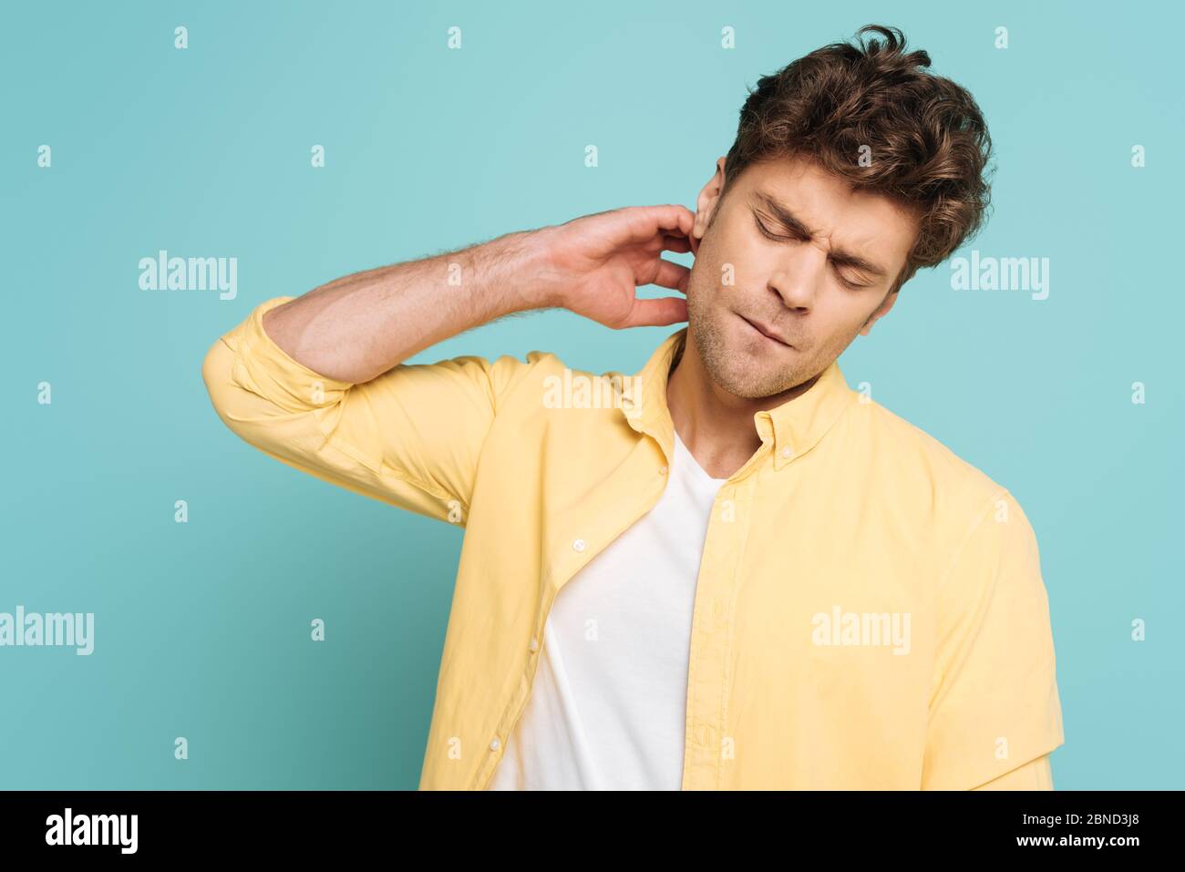 Man scratching neck hi-res stock photography and images - Alamy