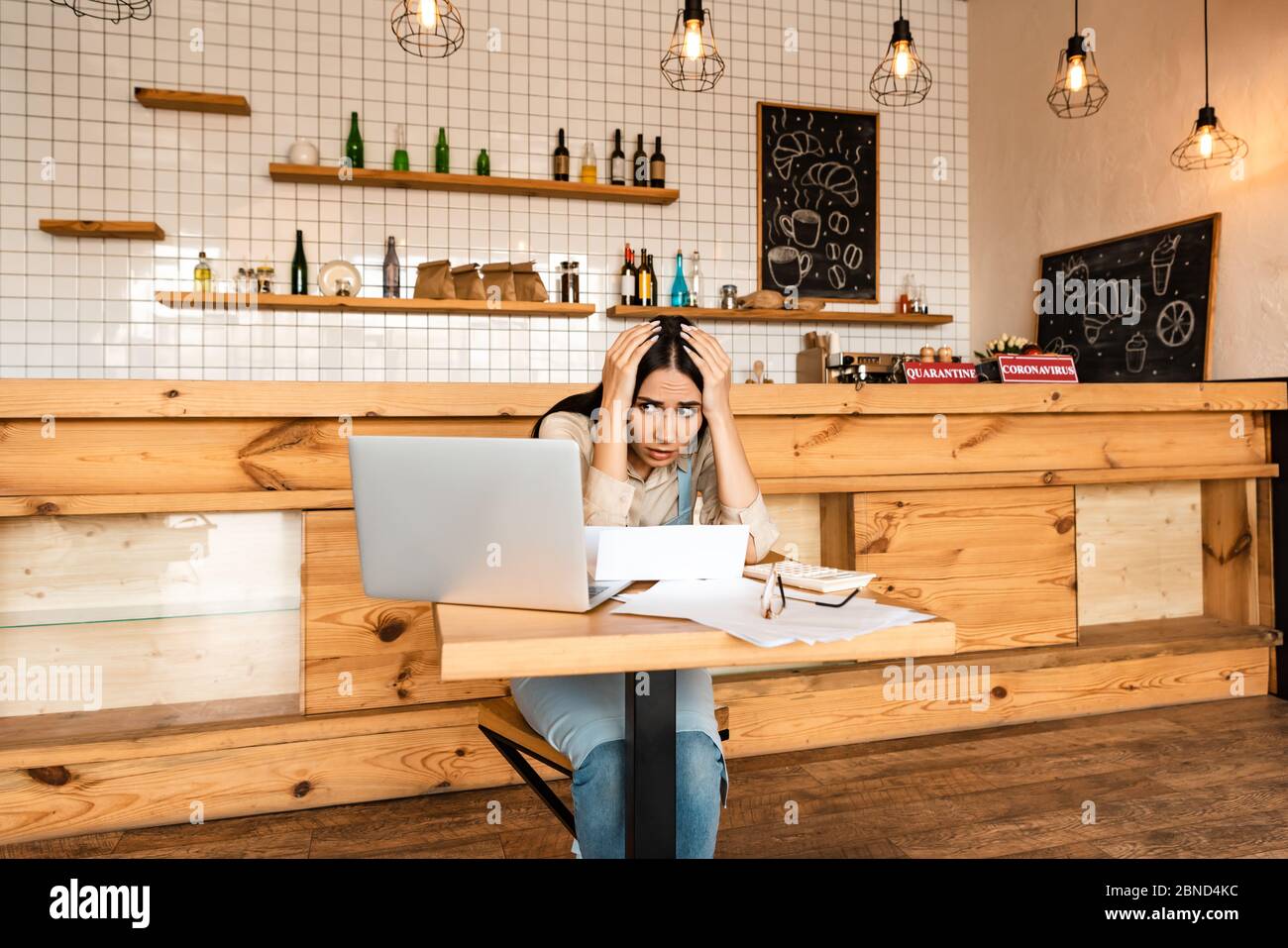 Worried cafe owner table hi-res stock photography and images - Alamy