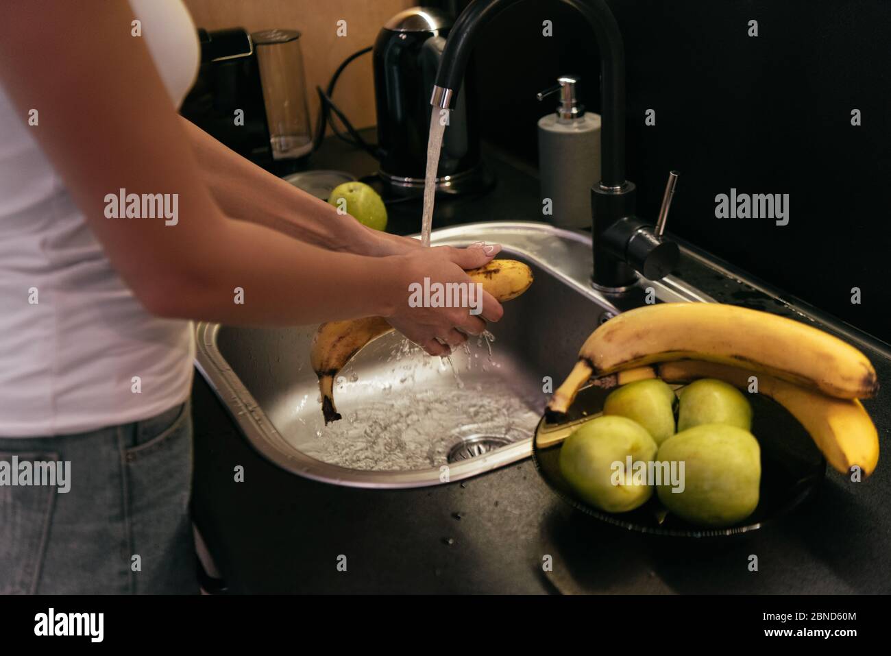 Washing bananas hi-res stock photography and images - Alamy