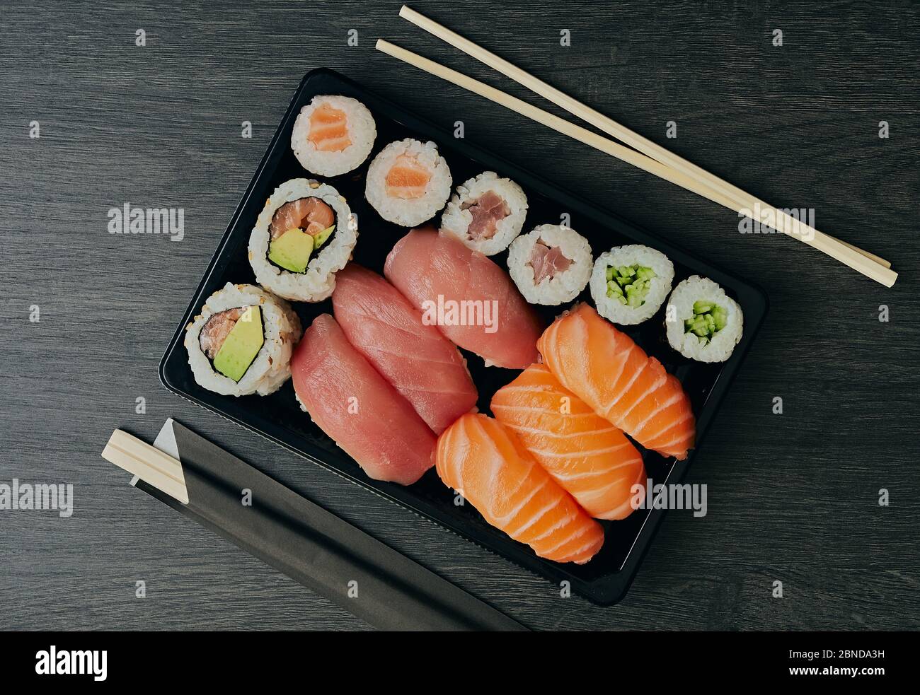 Sushi to go concept take away box Stock Photo - Alamy