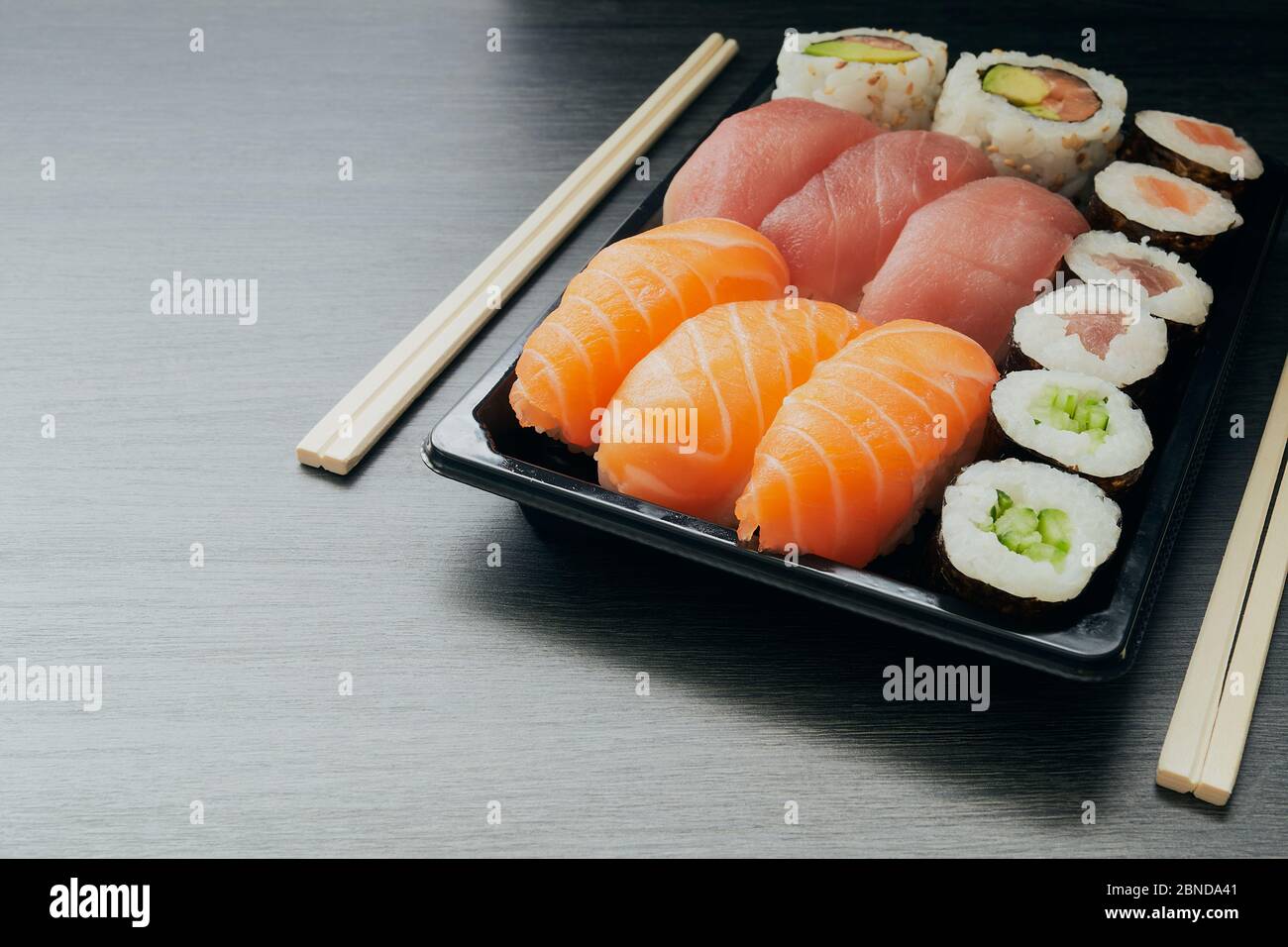 Sushi to go concept take away box Stock Photo - Alamy