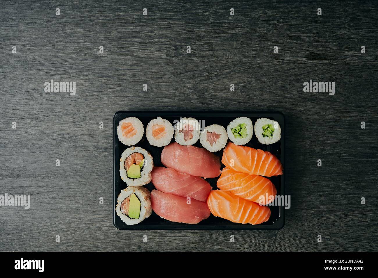Sushi to go concept take away box Stock Photo - Alamy
