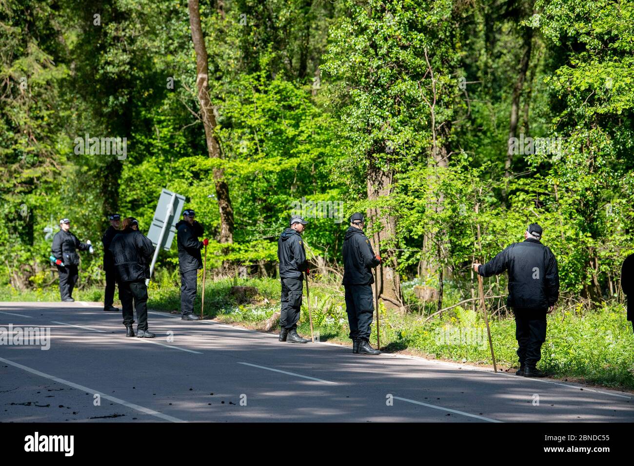 A police search team search woodland next to Stowfield Quarry near ...