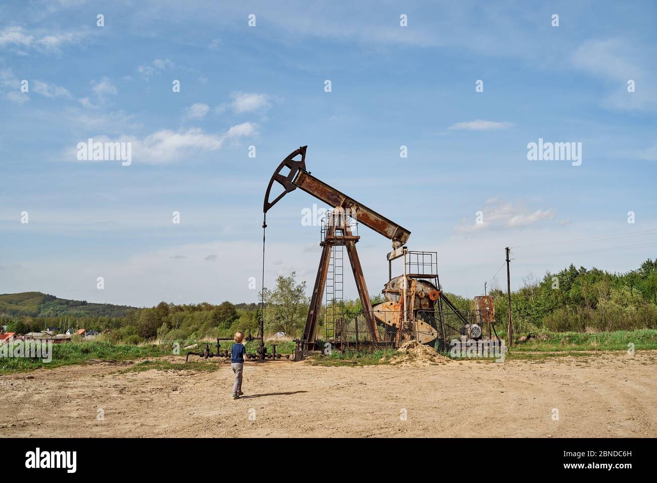 people and oil pump oil extraction Stock Photo - Alamy