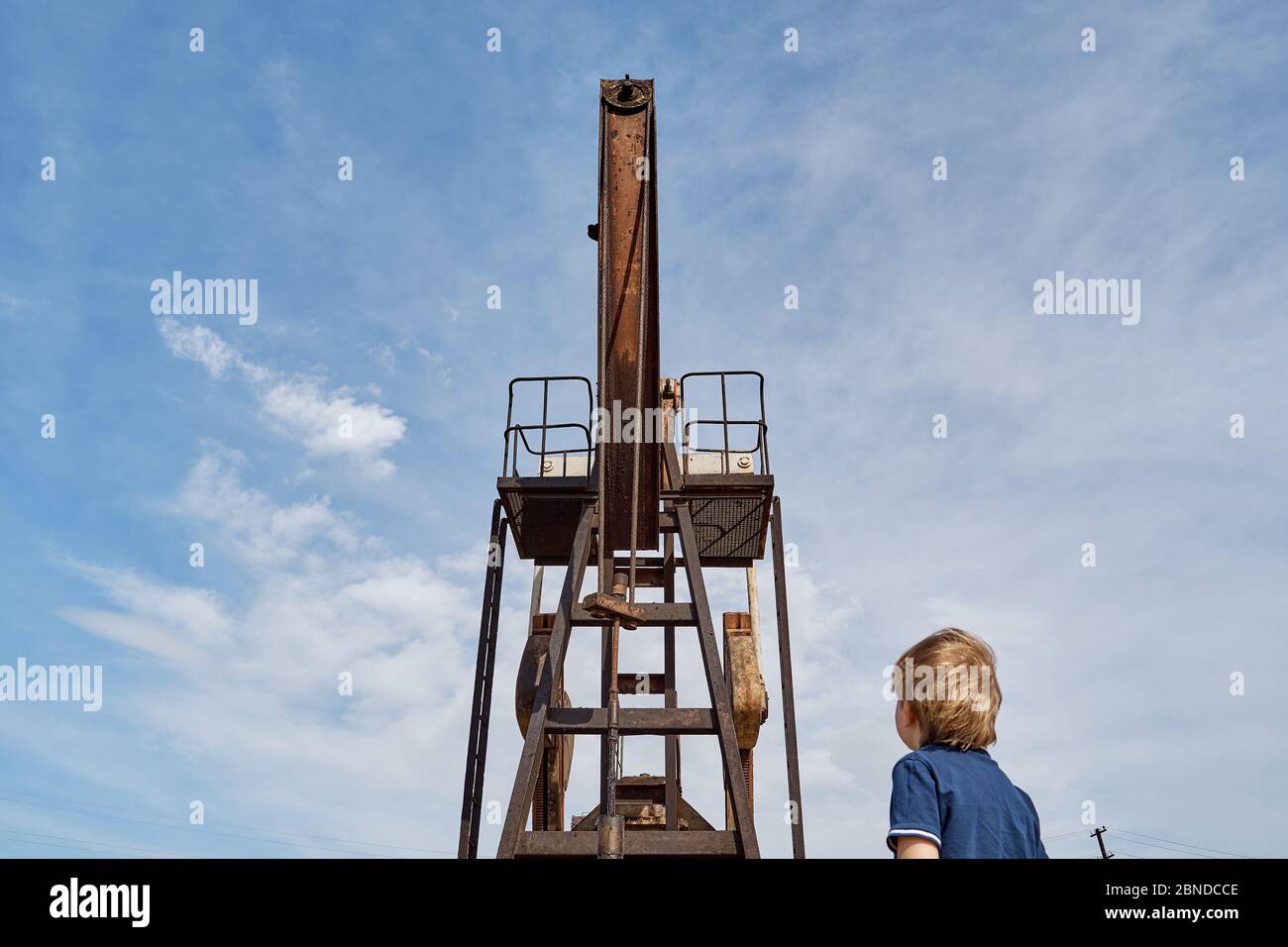 people and oil pump oil extraction Stock Photo - Alamy