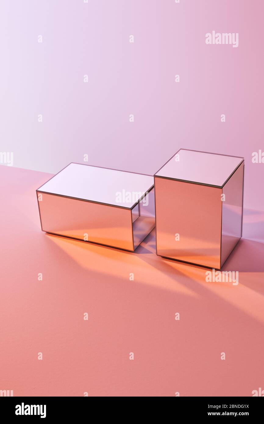 cubes with light reflection on surface on pink background Stock Photo ...