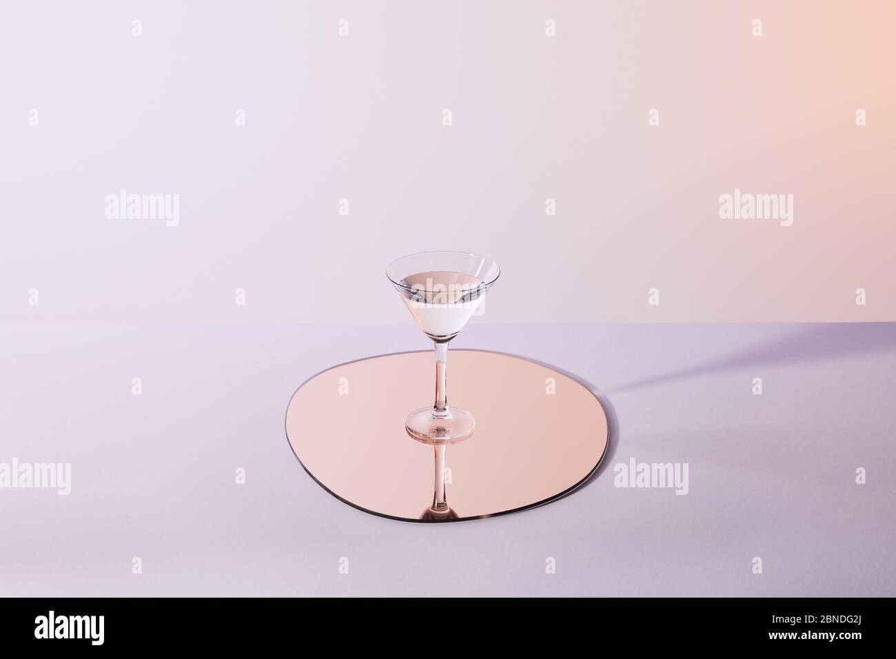 cocktail glass with liquid on mirror with reflection Stock Photo - Alamy