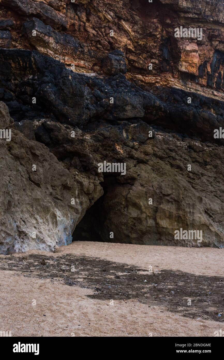 Beach of Nazare, Portugal. Cliff and sand Stock Photo - Alamy