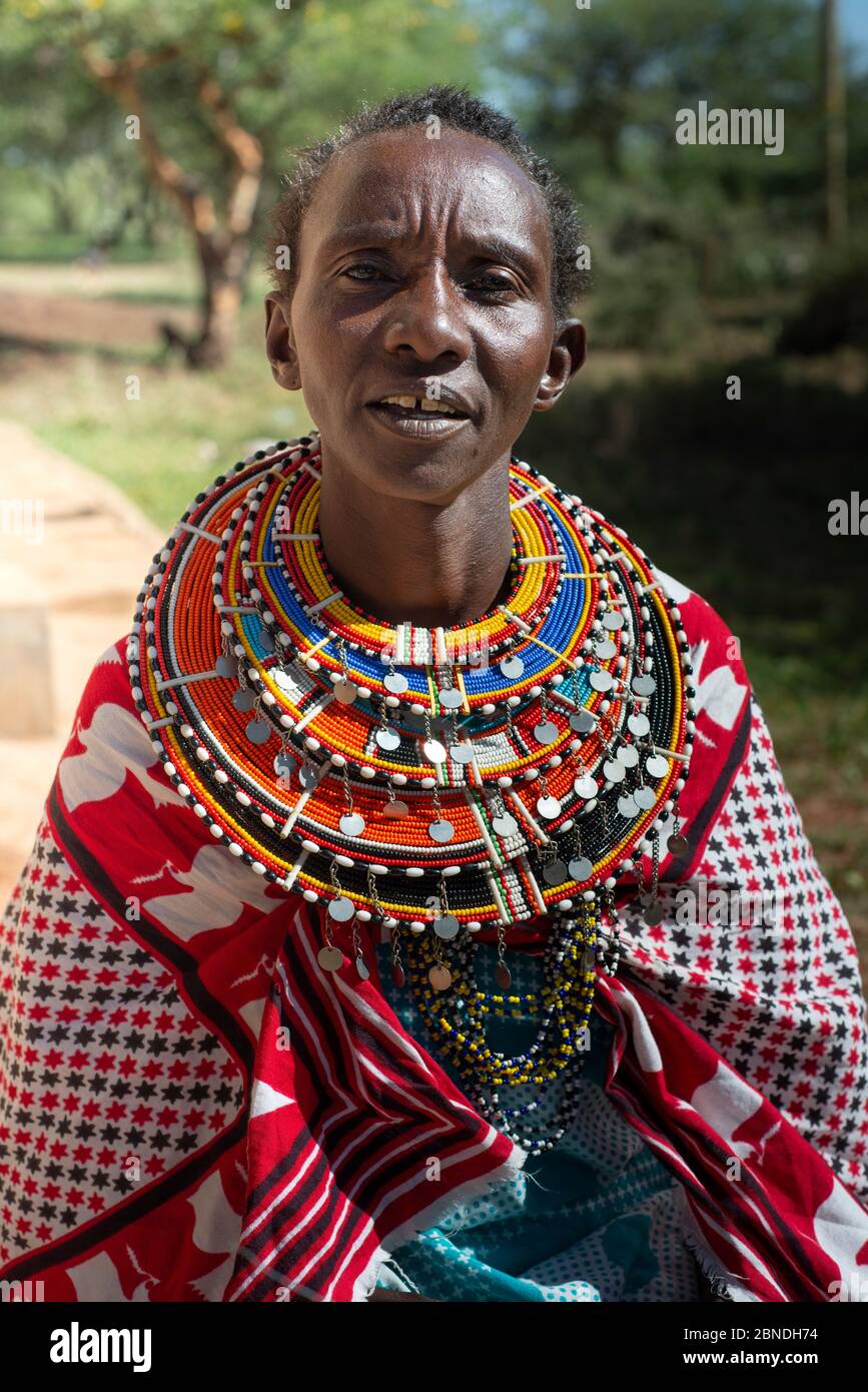 Maasai woman in traditional clothes Stock Photo - Alamy