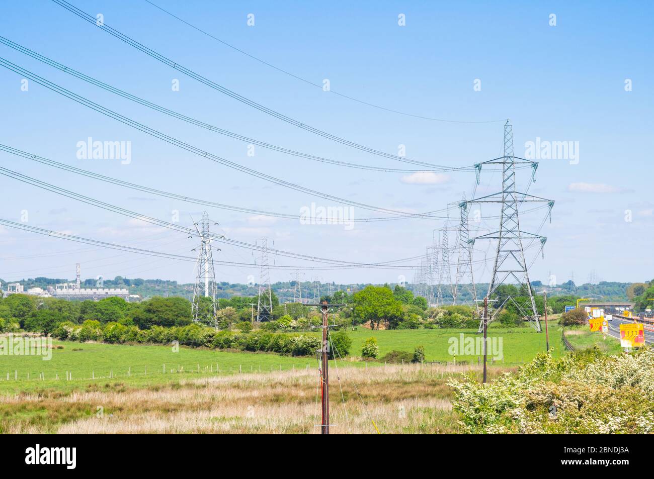 Electricity pylon row hi-res stock photography and images - Alamy