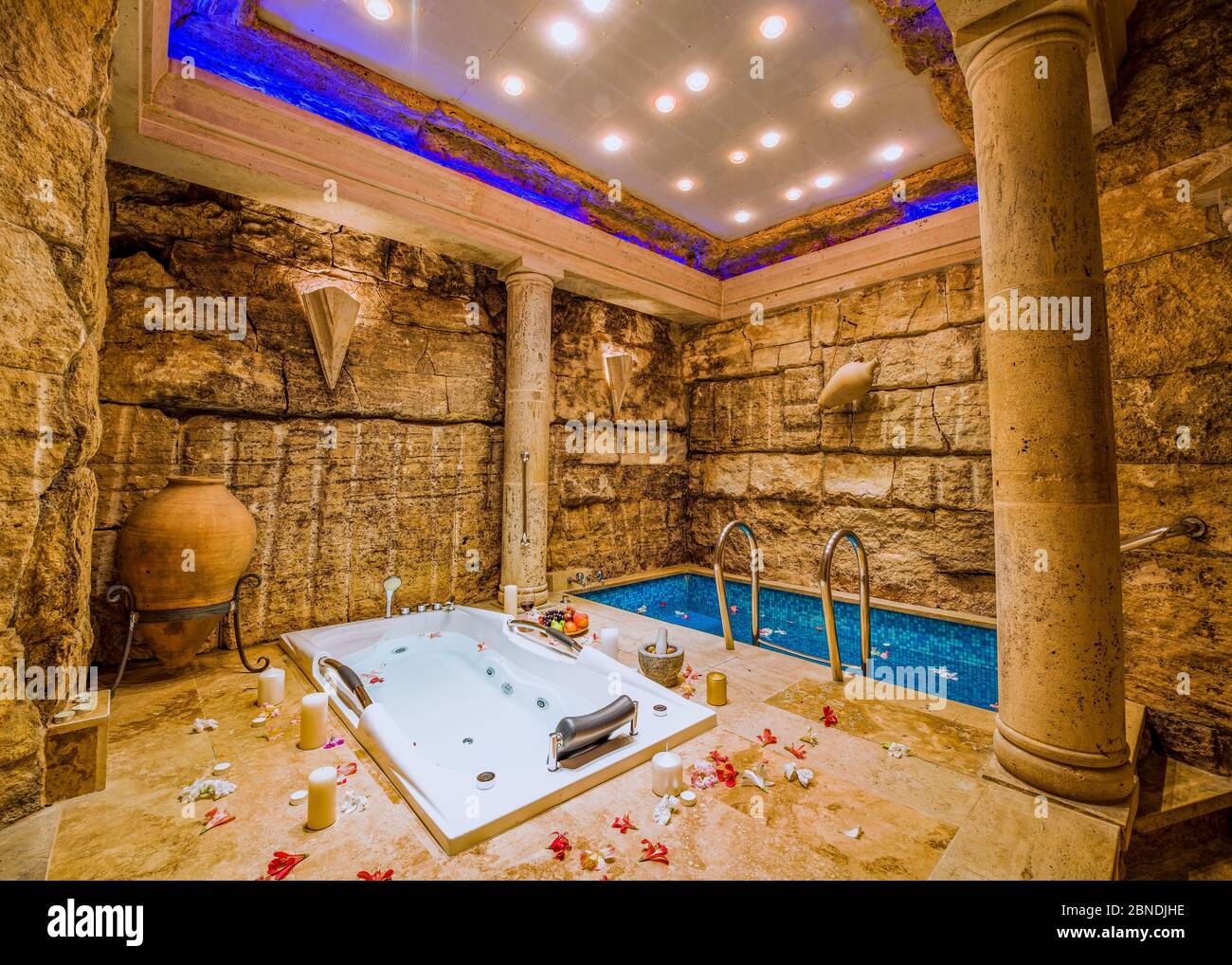 Ancient room design with bathtub and a small indoor pool Stock Photo ...