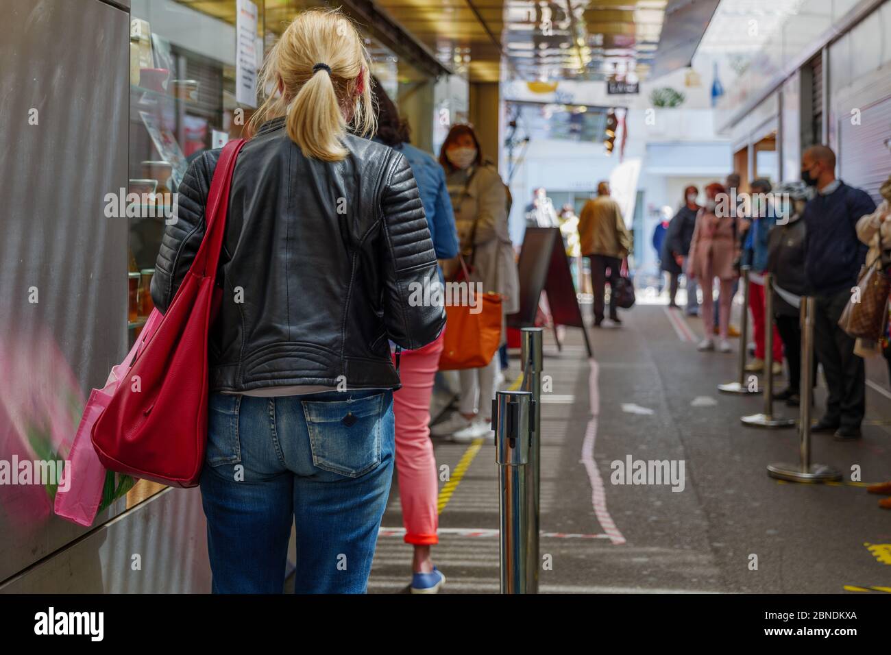 Group of European people queue and wait for buy food in front of stall ...