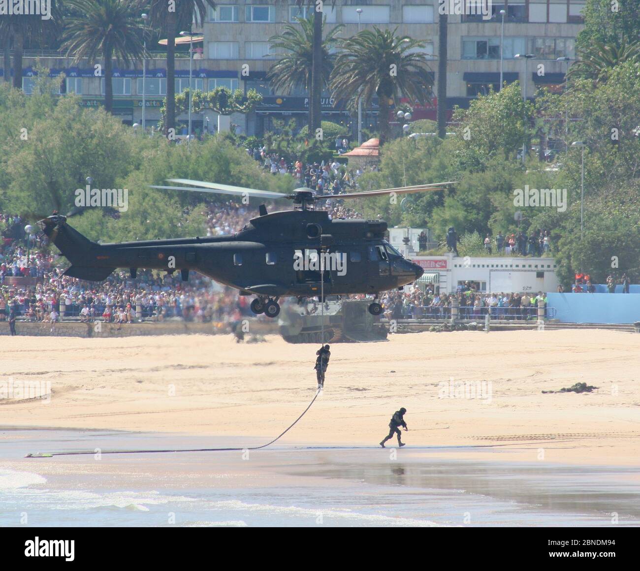 Series 44 of 165 AAV-7A amphibious vehicles on the beach and soldiers ...