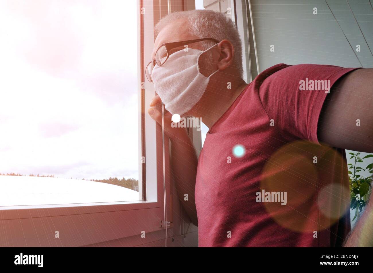 Self isolation looks out the window hope hi-res stock photography and ...