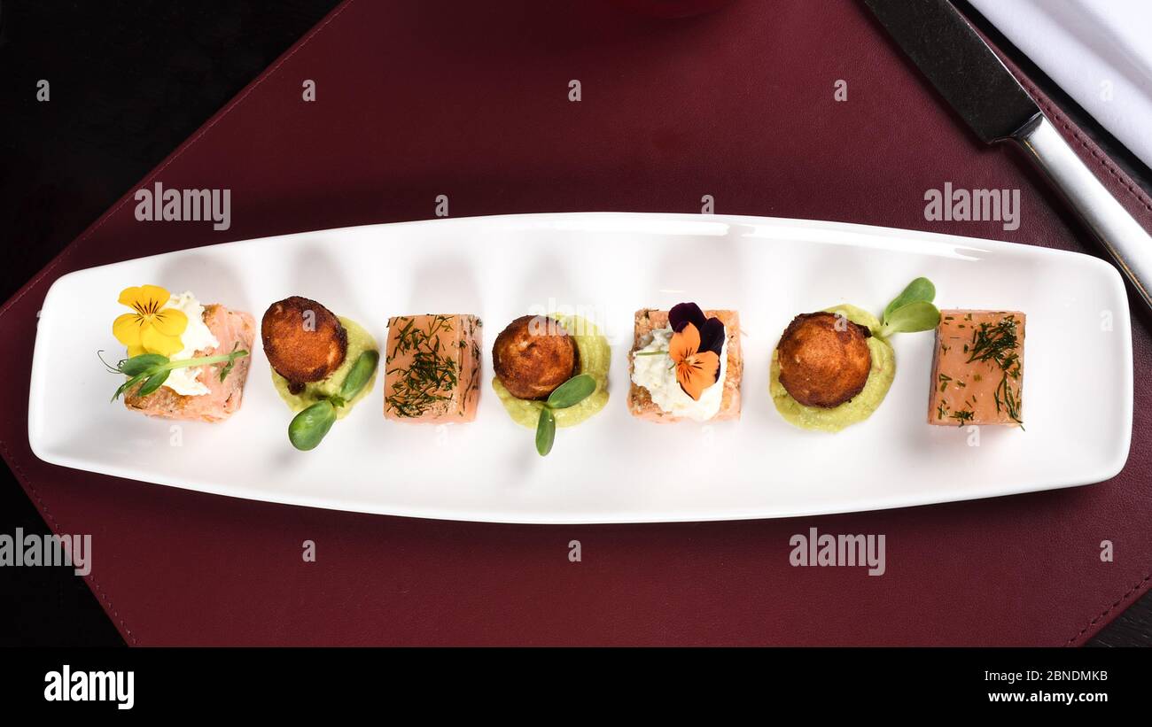 Pan-seared scallops, pear and mint puree. Gourmet elegant luxury eating ...