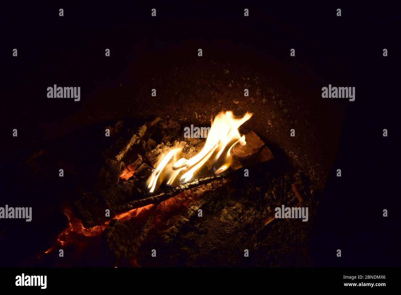 High angle shot of a campfire on the ground in the night - perfect for ...