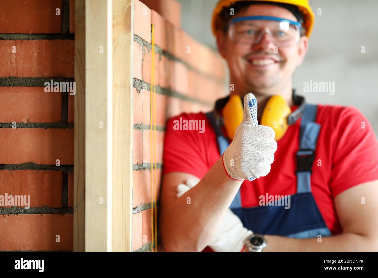 Cheerful man and well done sign Stock Photo - Alamy