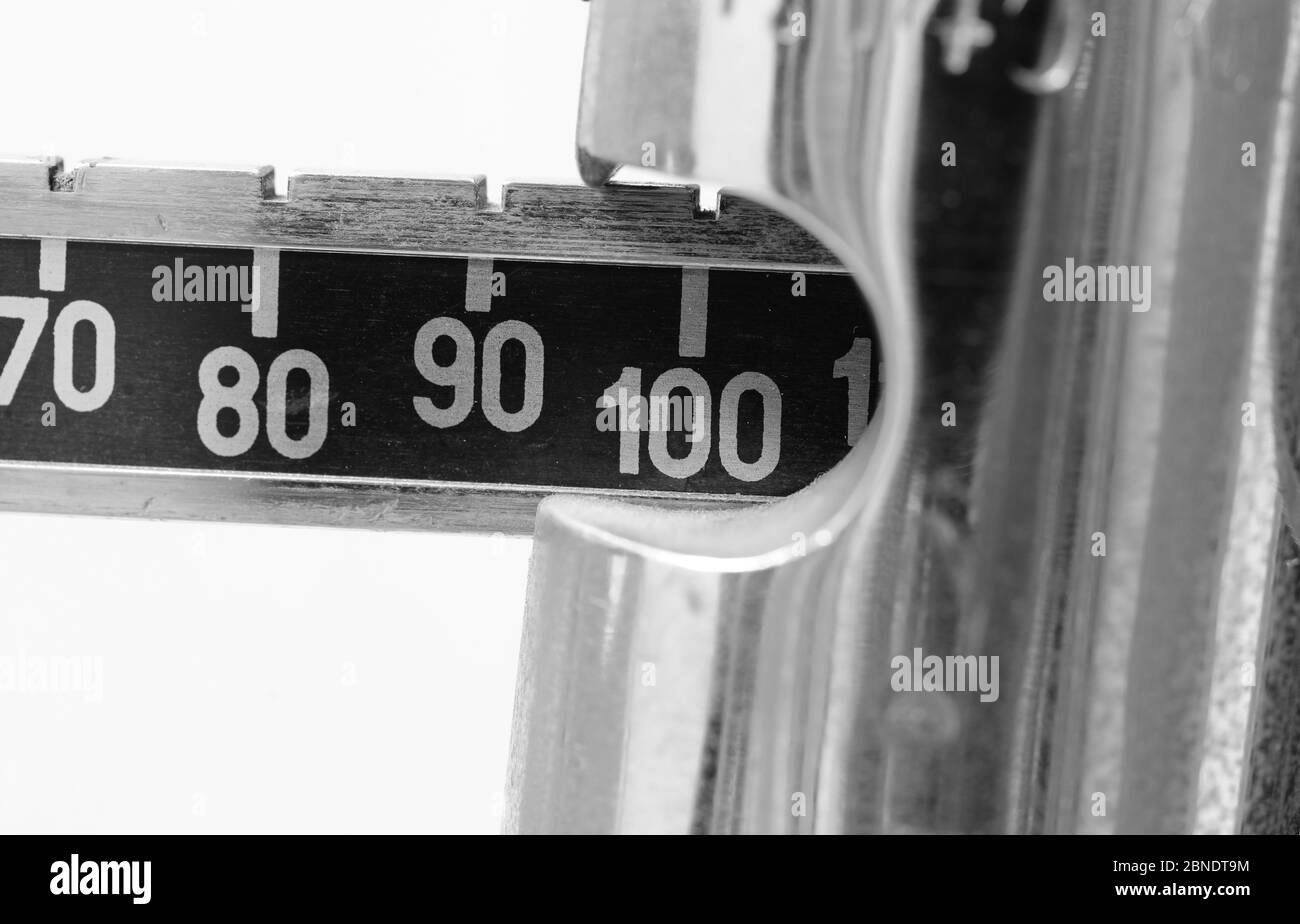 number 100 in the weight scale with black and white effect Stock Photo ...