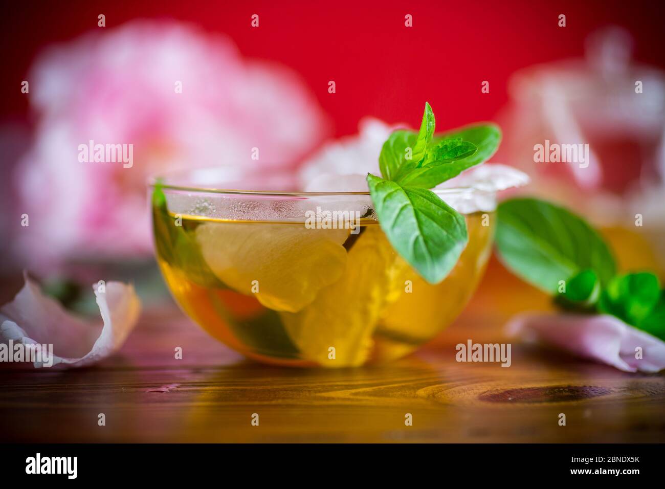 summer flower tea from rose petals in a glass cup Stock Photo - Alamy
