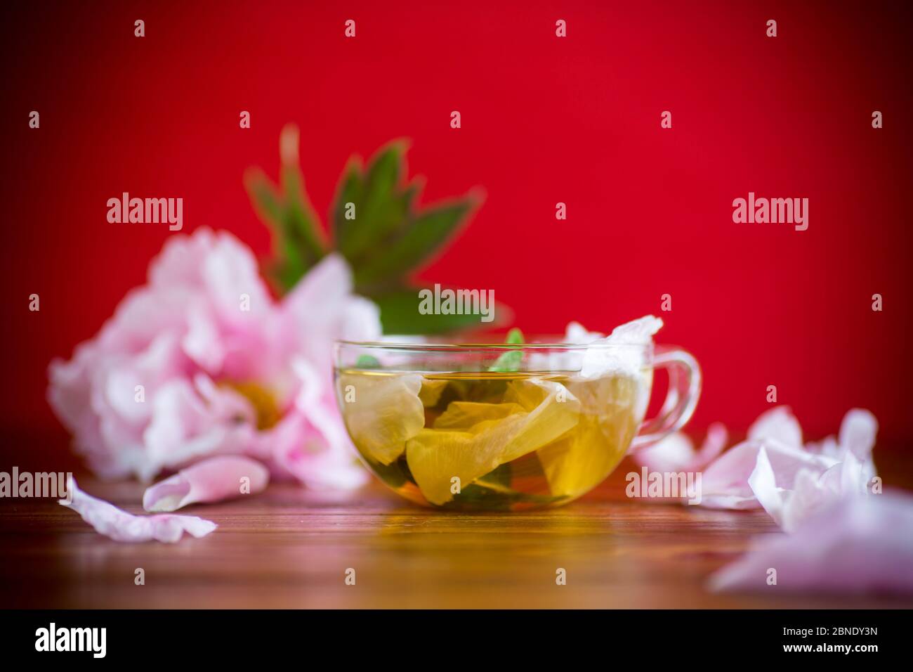 summer flower tea from rose petals in a glass cup Stock Photo - Alamy
