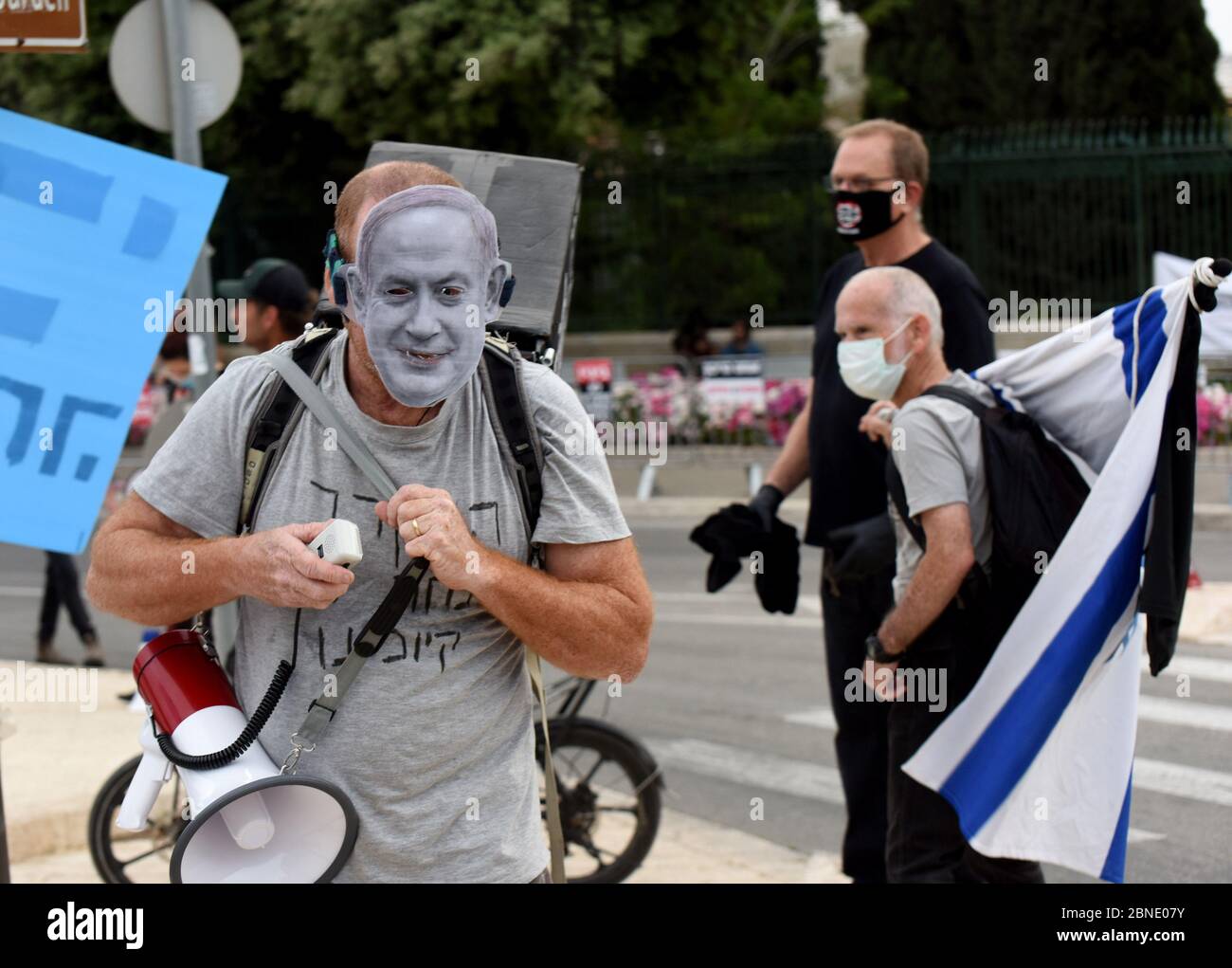Jerusalem, Israel. 14th May, 2020. An Israeli wears a mask of Prime ...