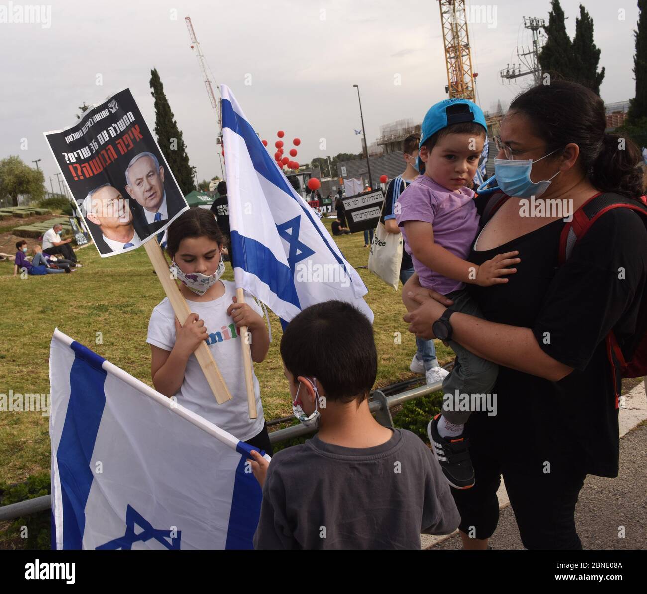 Jerusalem, Israel. 14th May, 2020. An Israeli family wears protective ...